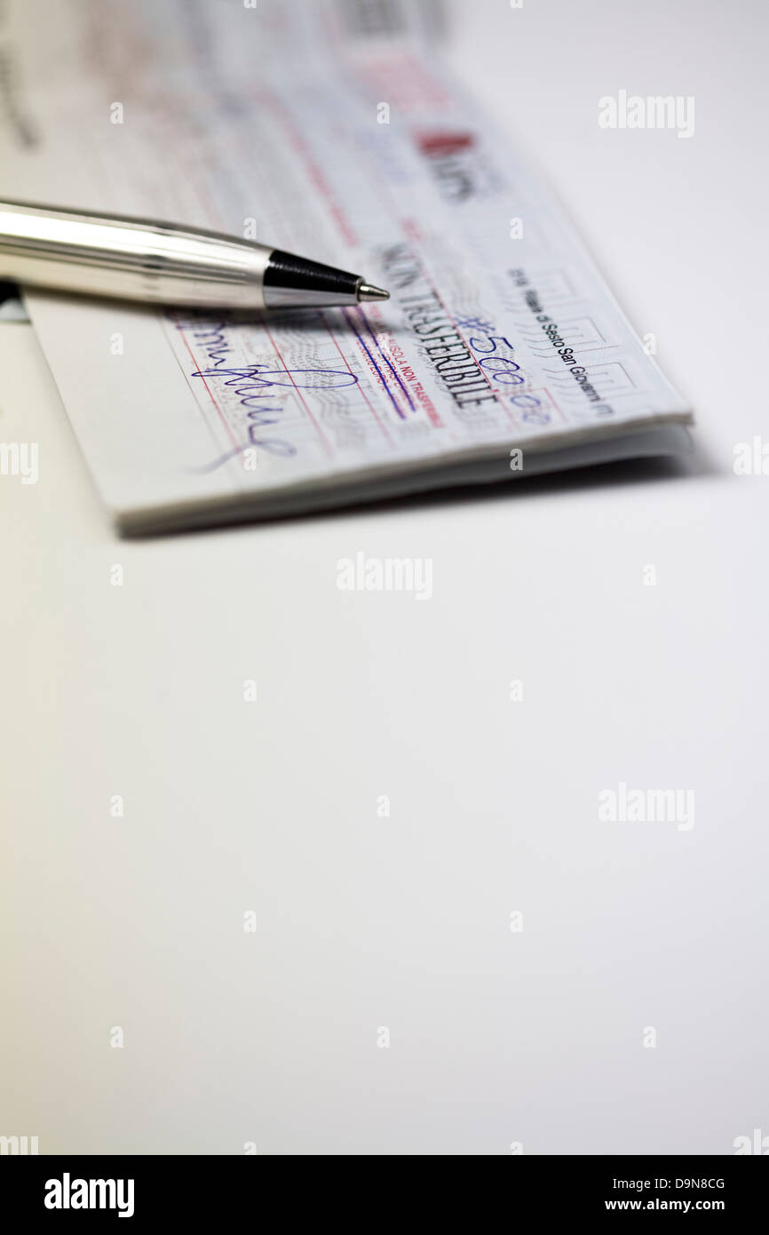 Signing cheques hi-res stock photography and images - Alamy