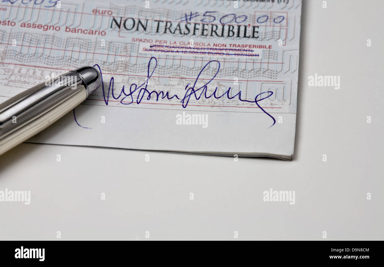 Signing cheques hi-res stock photography and images - Alamy