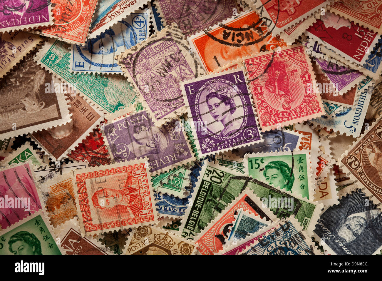 Used stamp collection in pile hi-res stock photography and images - Alamy