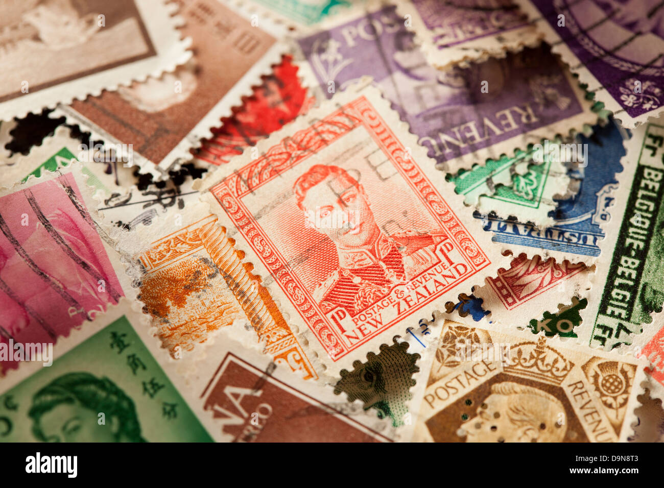 Used stamp collection in pile hi-res stock photography and images - Alamy