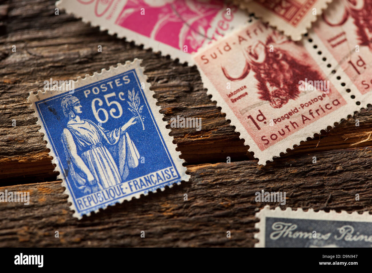 Used stamp collection in pile hi-res stock photography and images - Alamy