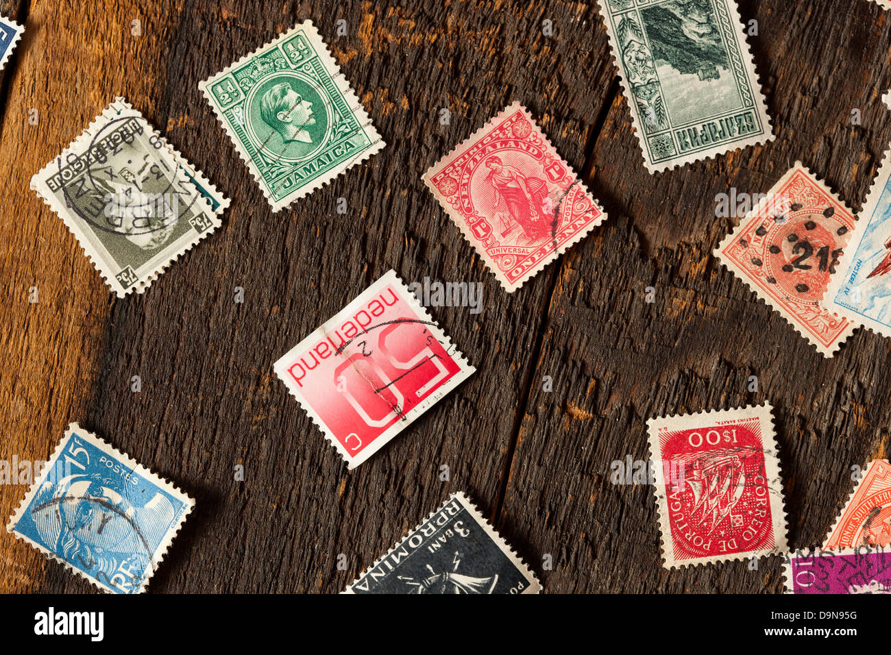 Colorful Vintage Used Postage Stamps in a pile Stock Photo - Alamy