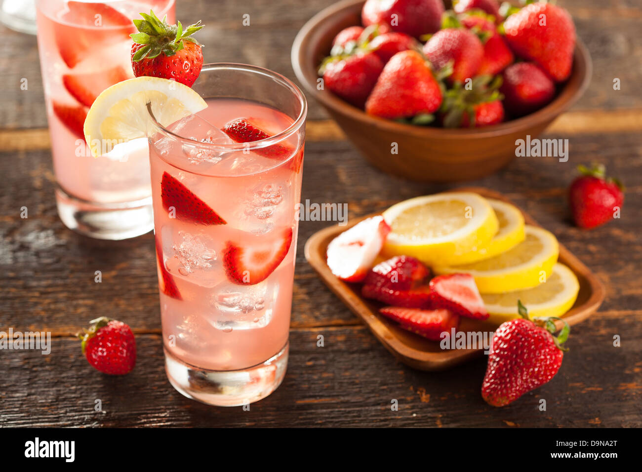Refreshing Ice Cold Strawberry Lemonade on a background Stock Photo - Alamy