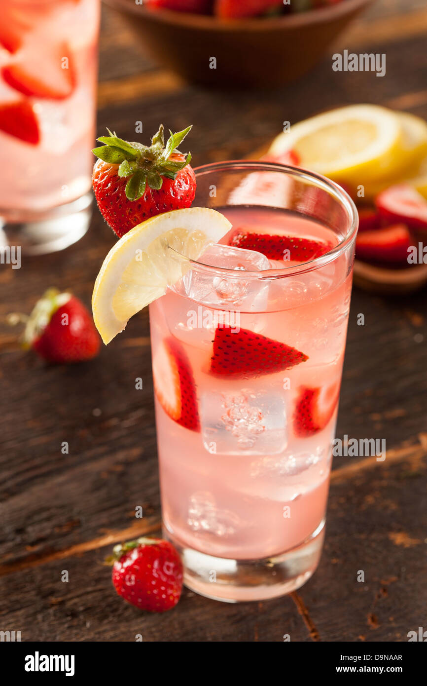 Refreshing Ice Cold Strawberry Lemonade on a background Stock Photo - Alamy