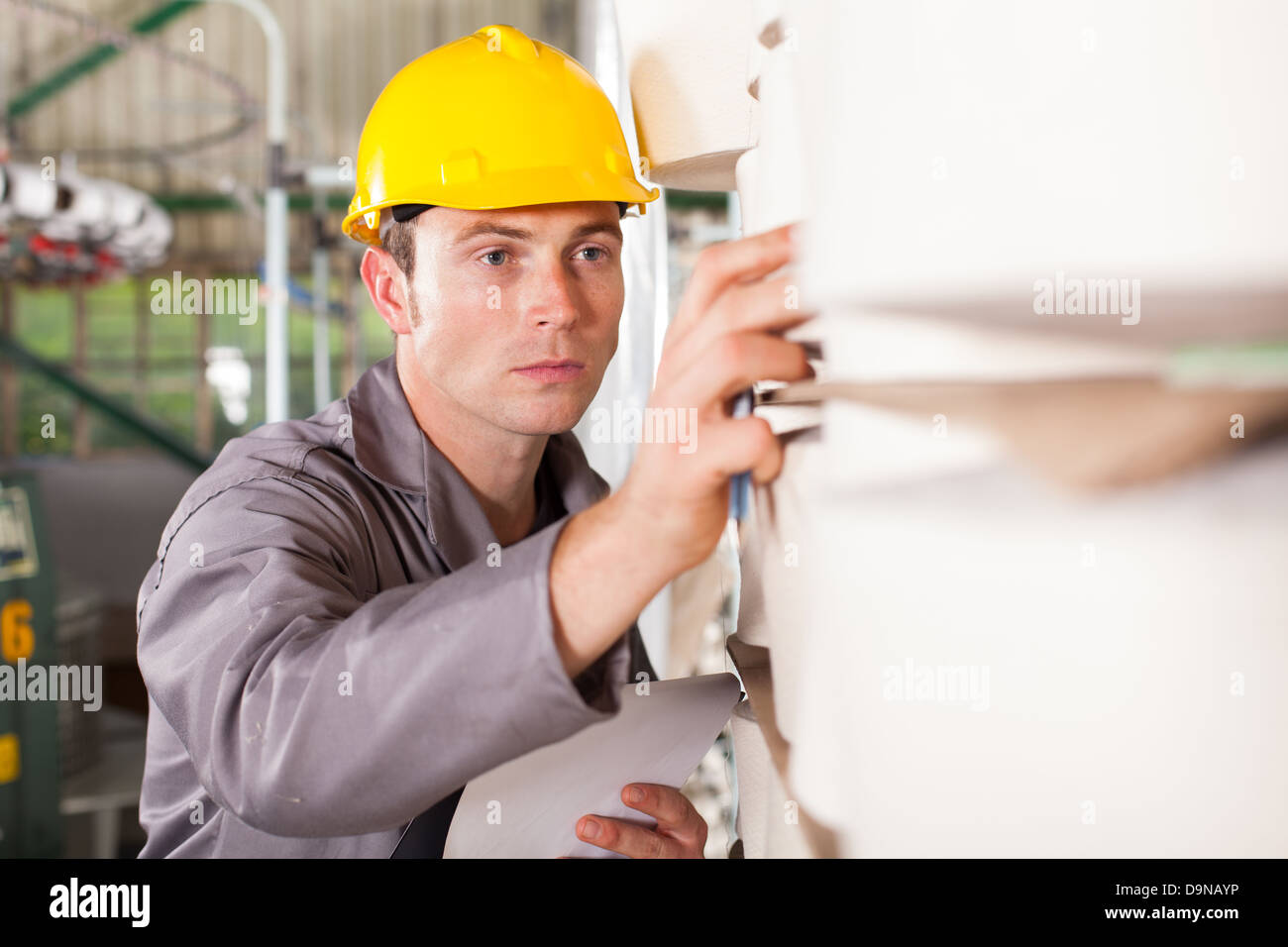textile industrial worker checking raw material Stock Photo - Alamy