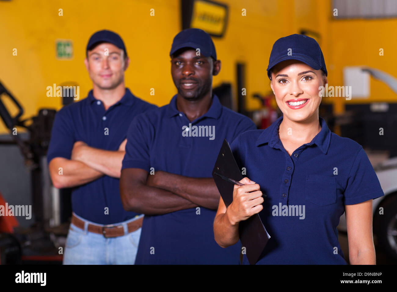 group of garage workers portrait Stock Photo - Alamy