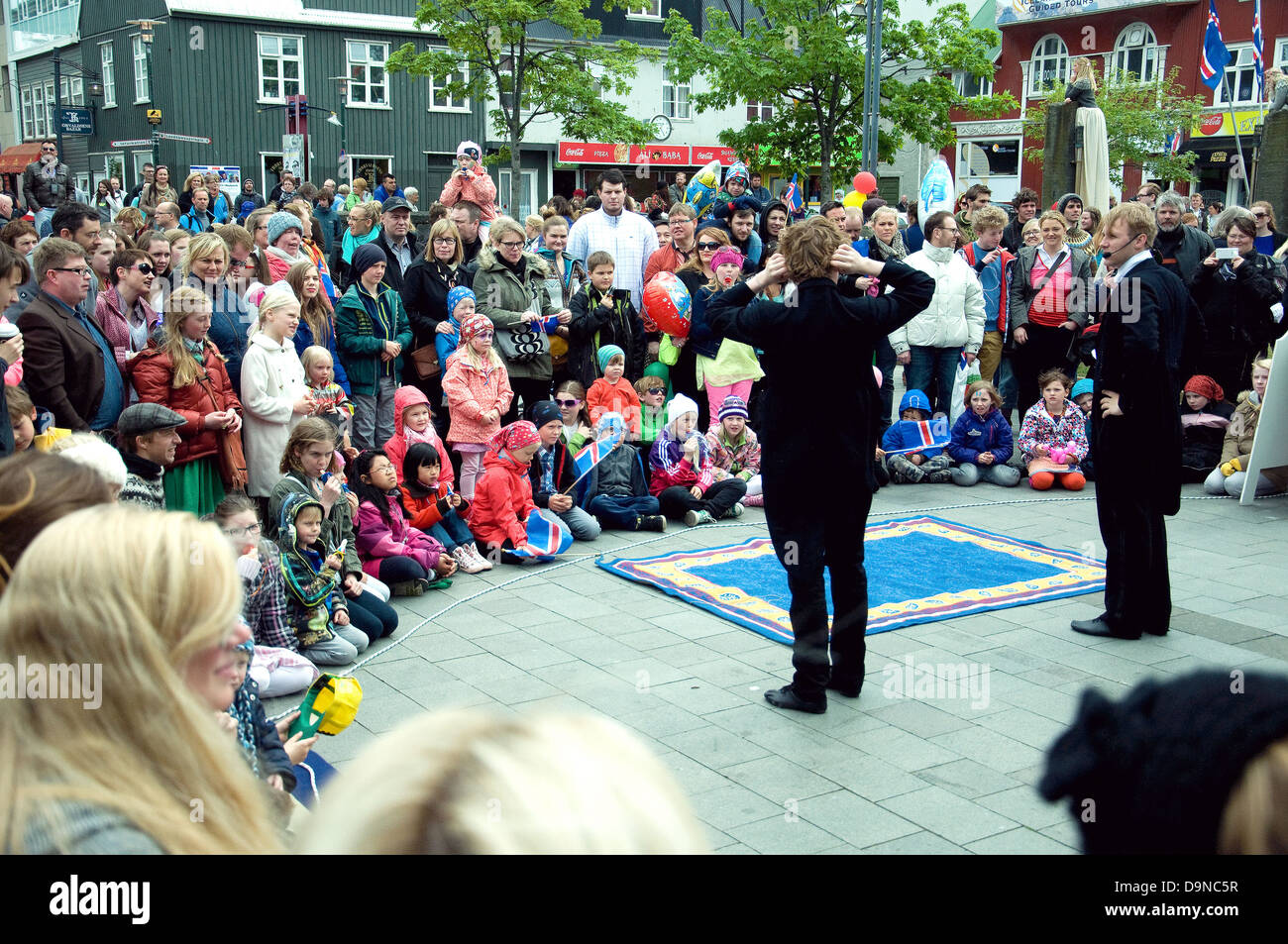 On Iceland's National Day two frock-coated entertainers perform before ...