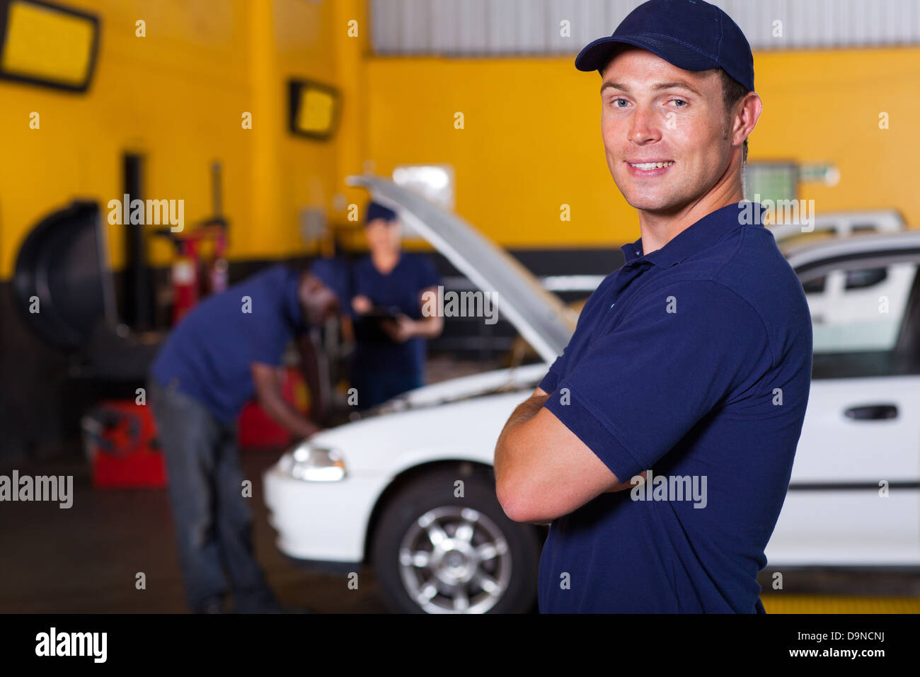 auto service business owner portrait inside workshop Stock Photo - Alamy