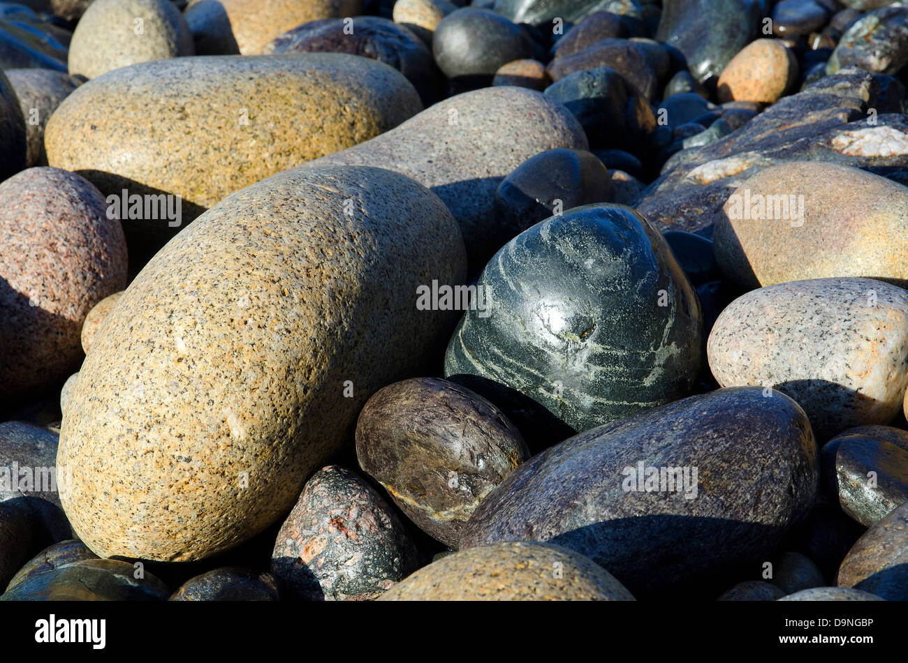 smooth rocks on a beach in cornwall, Uk Stock Photo - Alamy