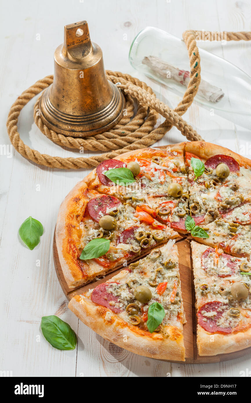 Pizza served on sailing ship Stock Photo - Alamy