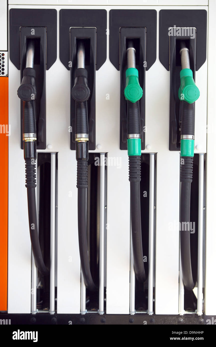 Horizontal shot of some fuel pumps at a gas station Stock Photo - Alamy