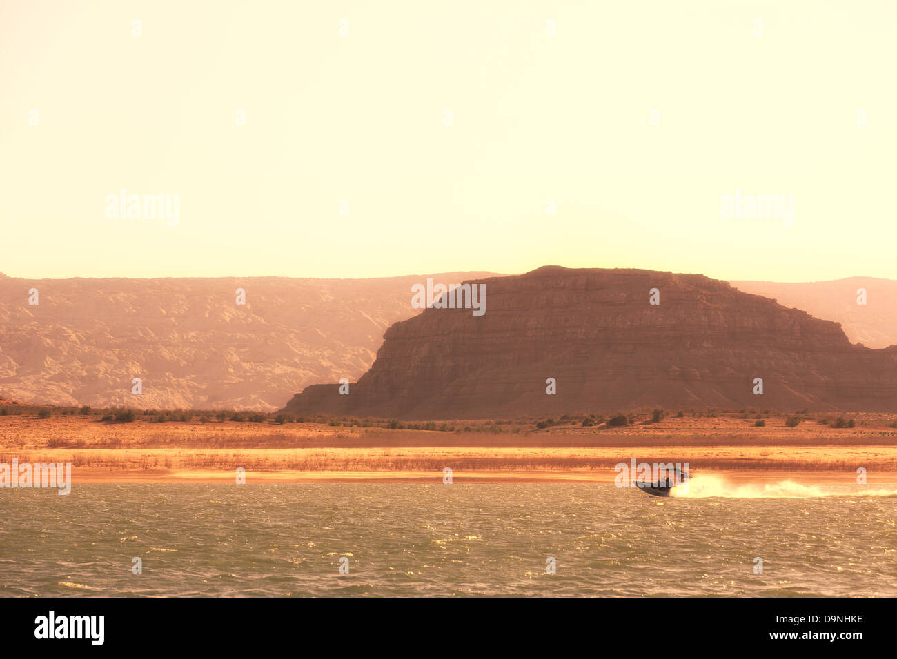 A boat under way in Bullfrog Bay at Lake Powell in Utah Stock Photo - Alamy