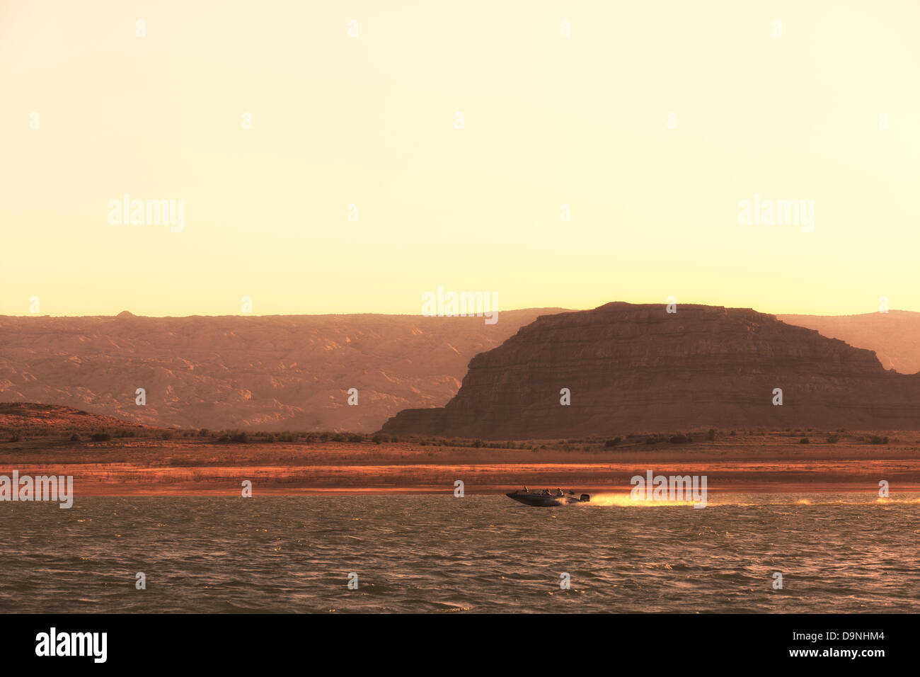 A boat under way in Bullfrog Bay at Lake Powell in Utah Stock Photo - Alamy