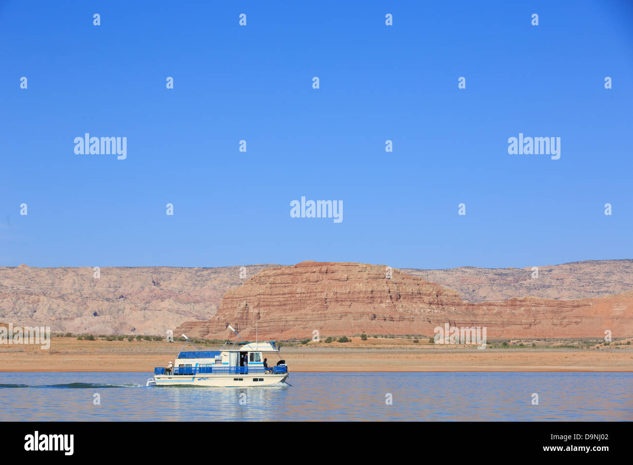 A houseboat under way in Bullfrog Bay at Lake Powell in Utah Stock ...