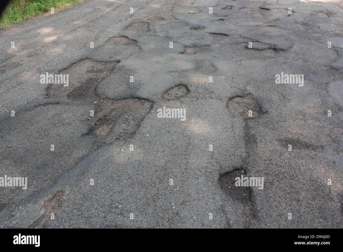 Uneven poor quality road surface hi-res stock photography and images ...