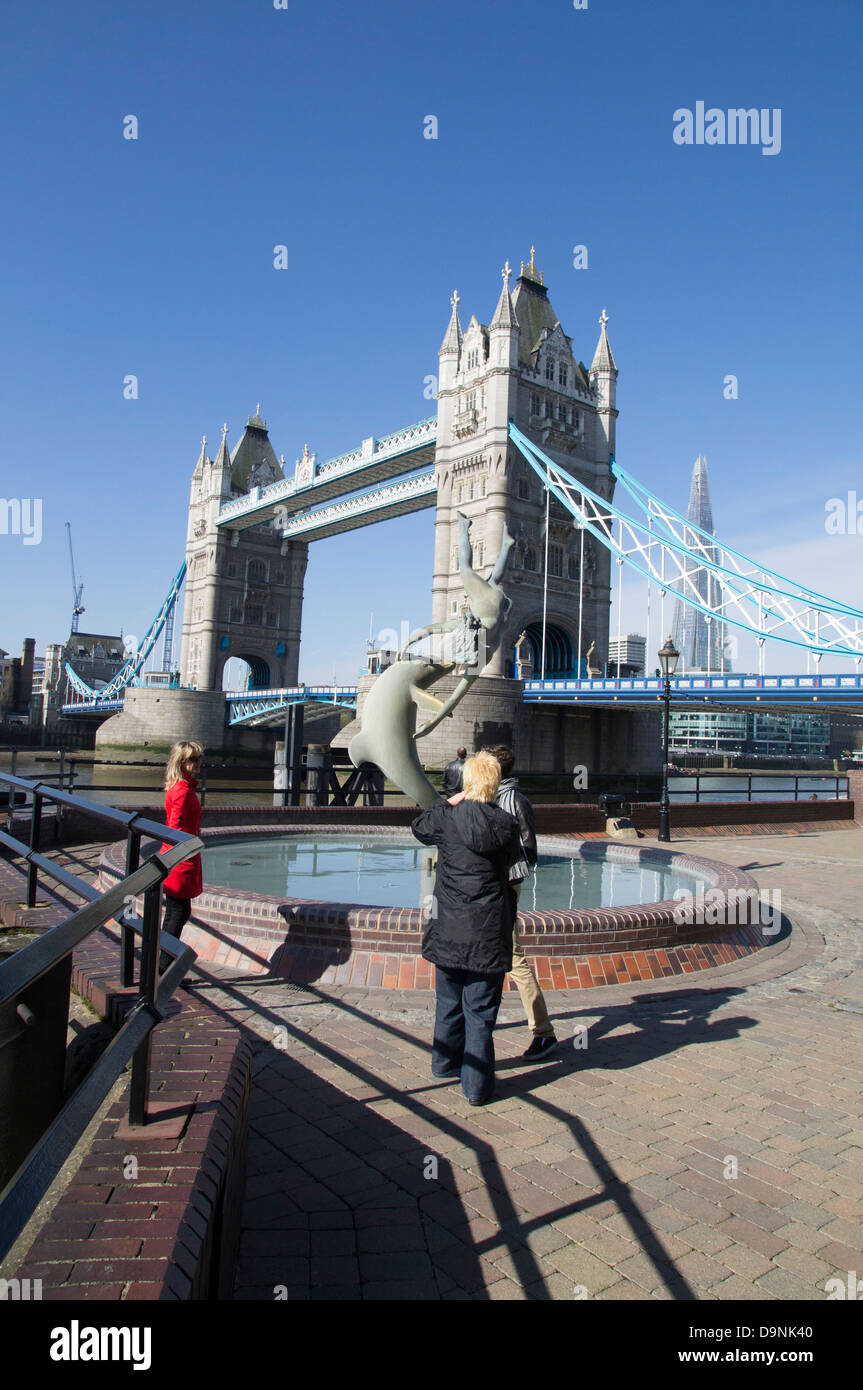 UK, England, London, Tower Bridge and Dolphin and girl statue Stock ...