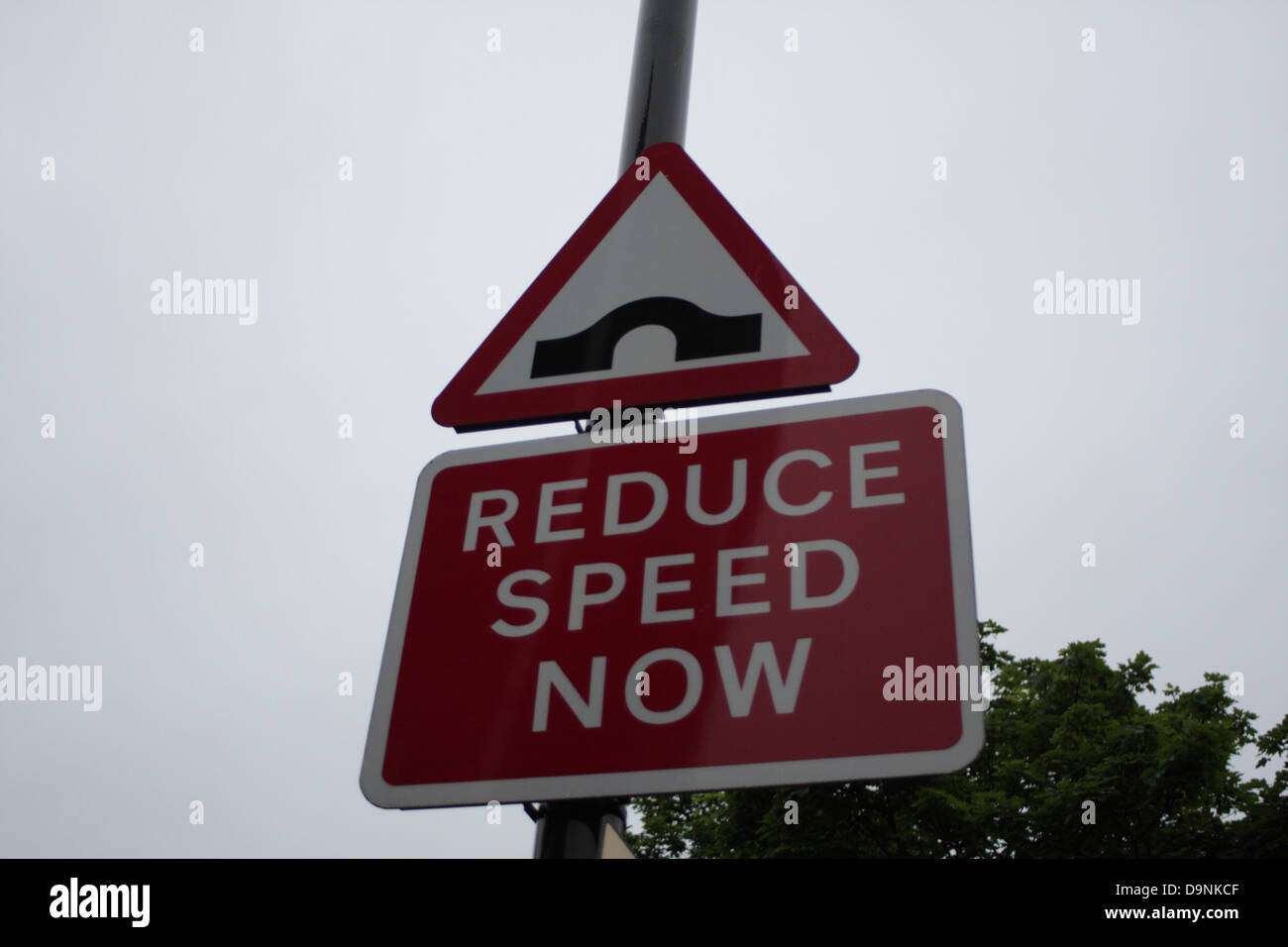 Road reduce speed now sign hi-res stock photography and images - Alamy