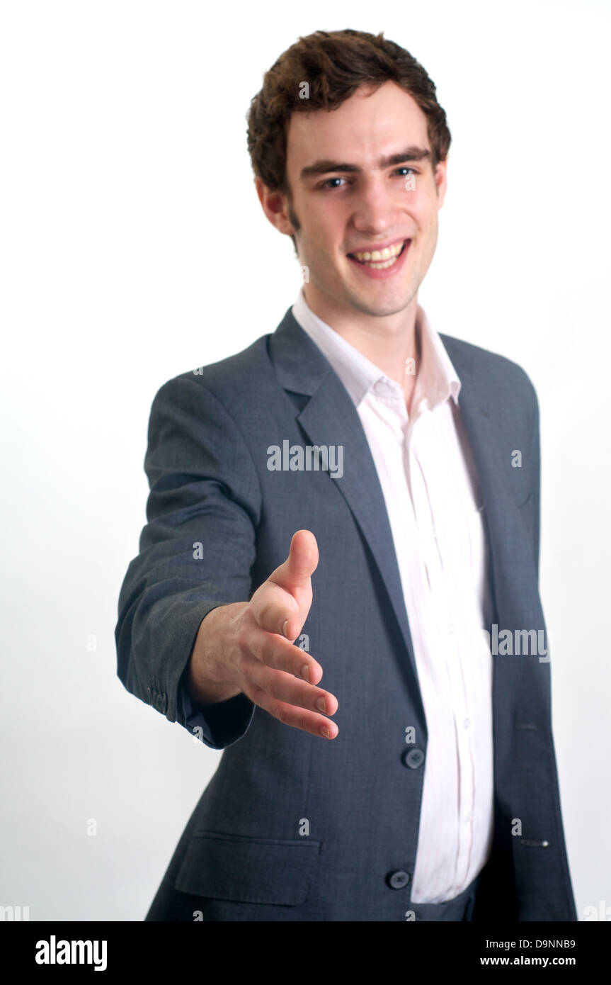 Professional young man shaking hand Stock Photo - Alamy