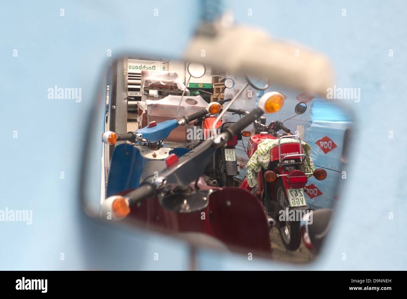 Simson Motorcycles are pictured in the mirror of a motorcycle in ...