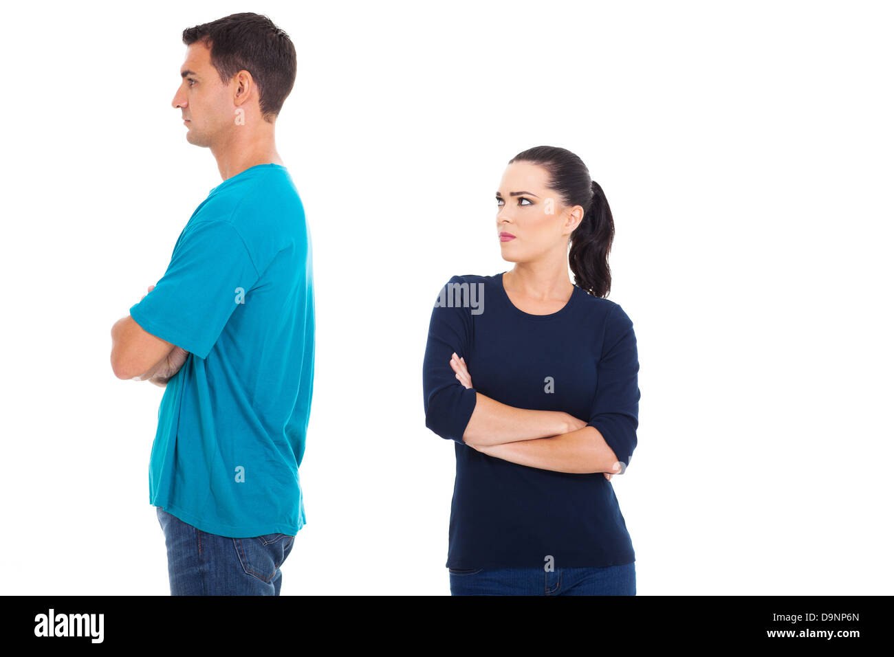 young couple having a dispute on white background Stock Photo - Alamy