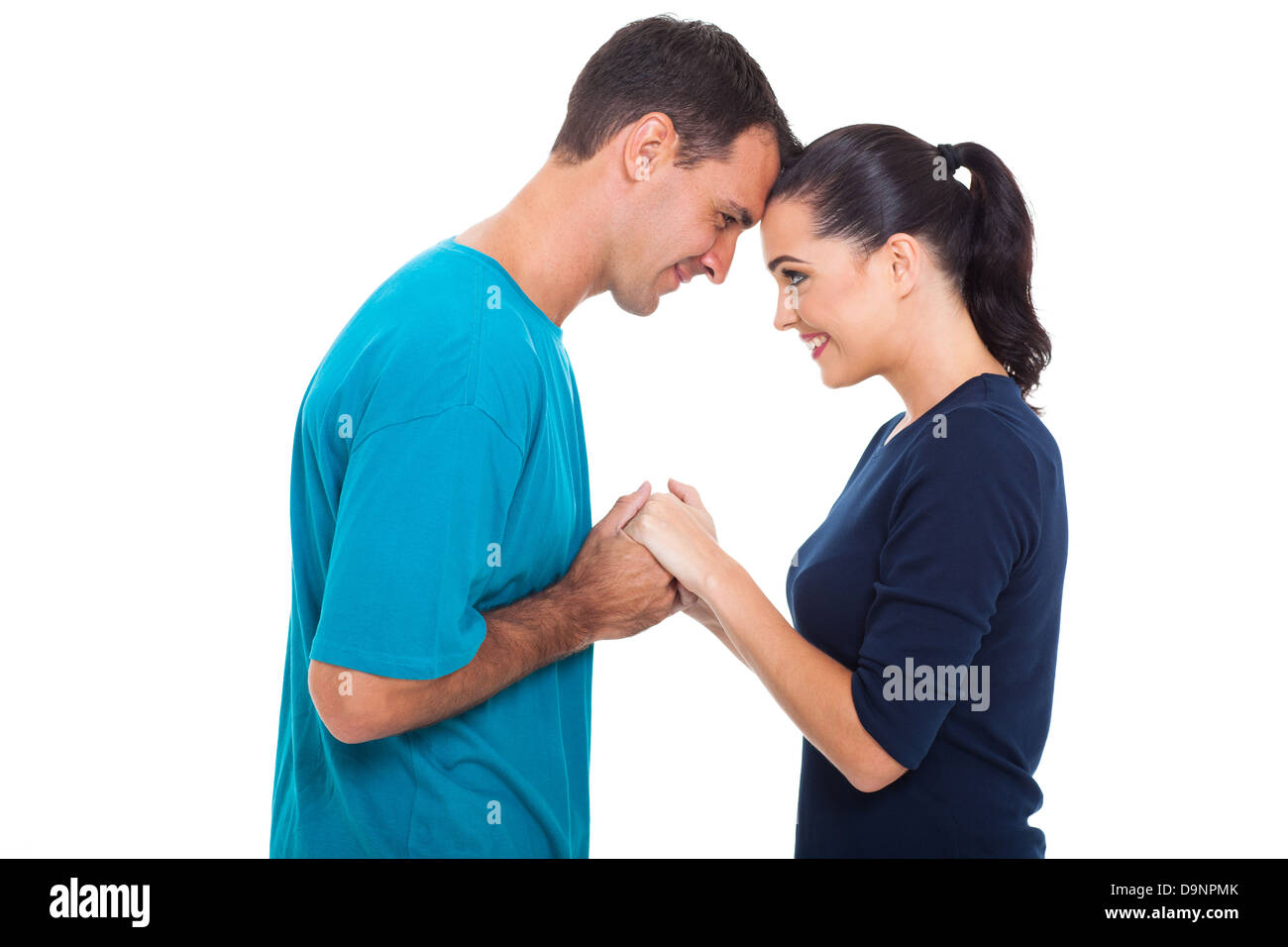 happy loving couple holding hands over white background Stock Photo - Alamy