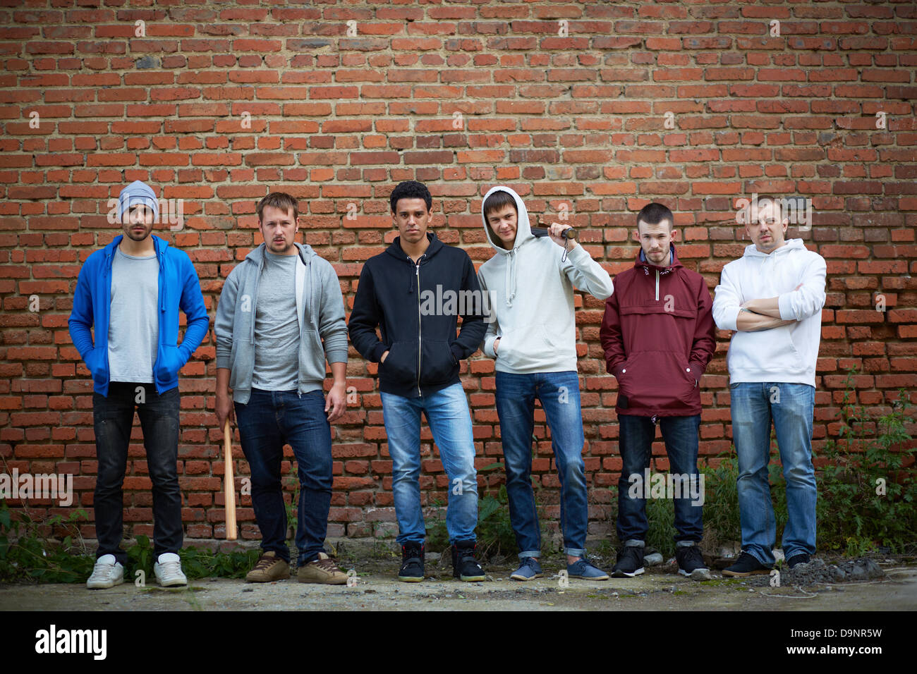 Portrait of several street hooligans or rappers Stock Photo - Alamy