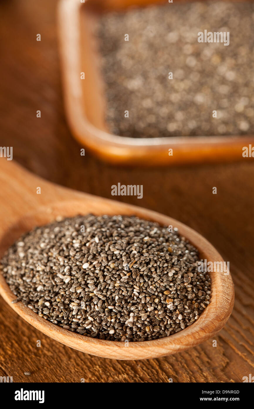Organic Dry Black and White Chia Seeds against a background Stock Photo ...