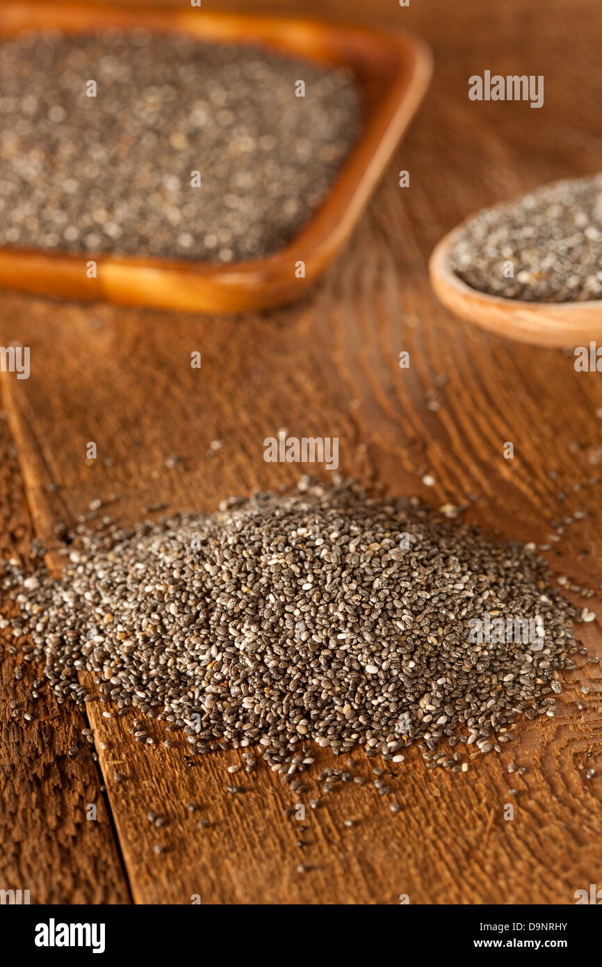 Organic Dry Black and White Chia Seeds against a background Stock Photo ...