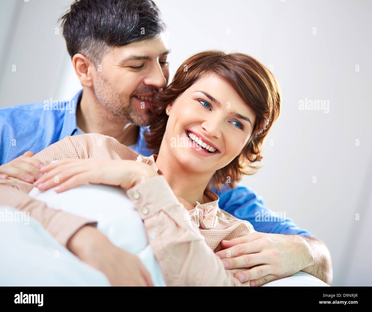 Portrait of joyful couple enjoying being together Stock Photo - Alamy