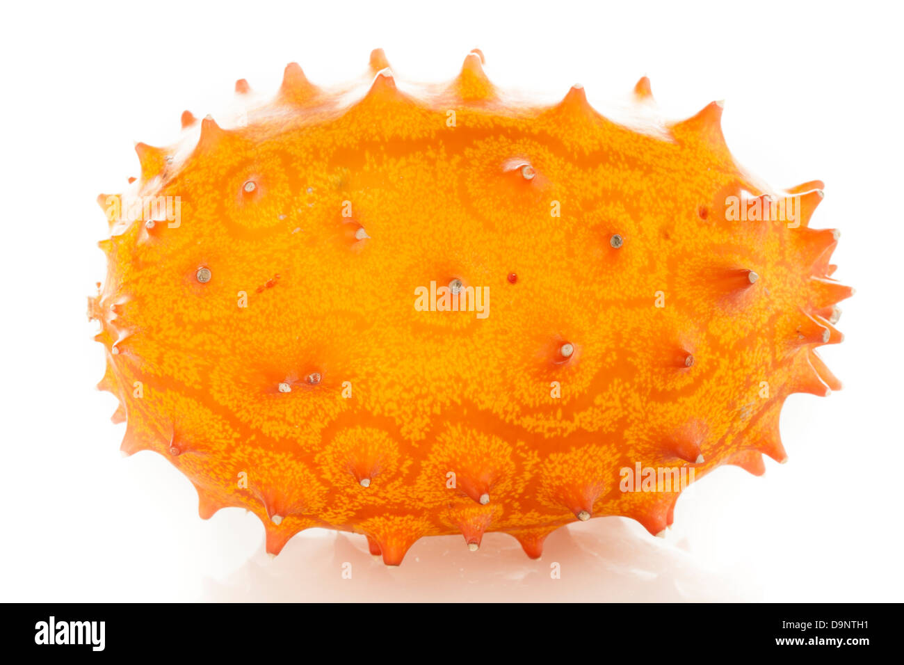 Organic Orange Kiwano Melon with Prickly Spikes Stock Photo - Alamy