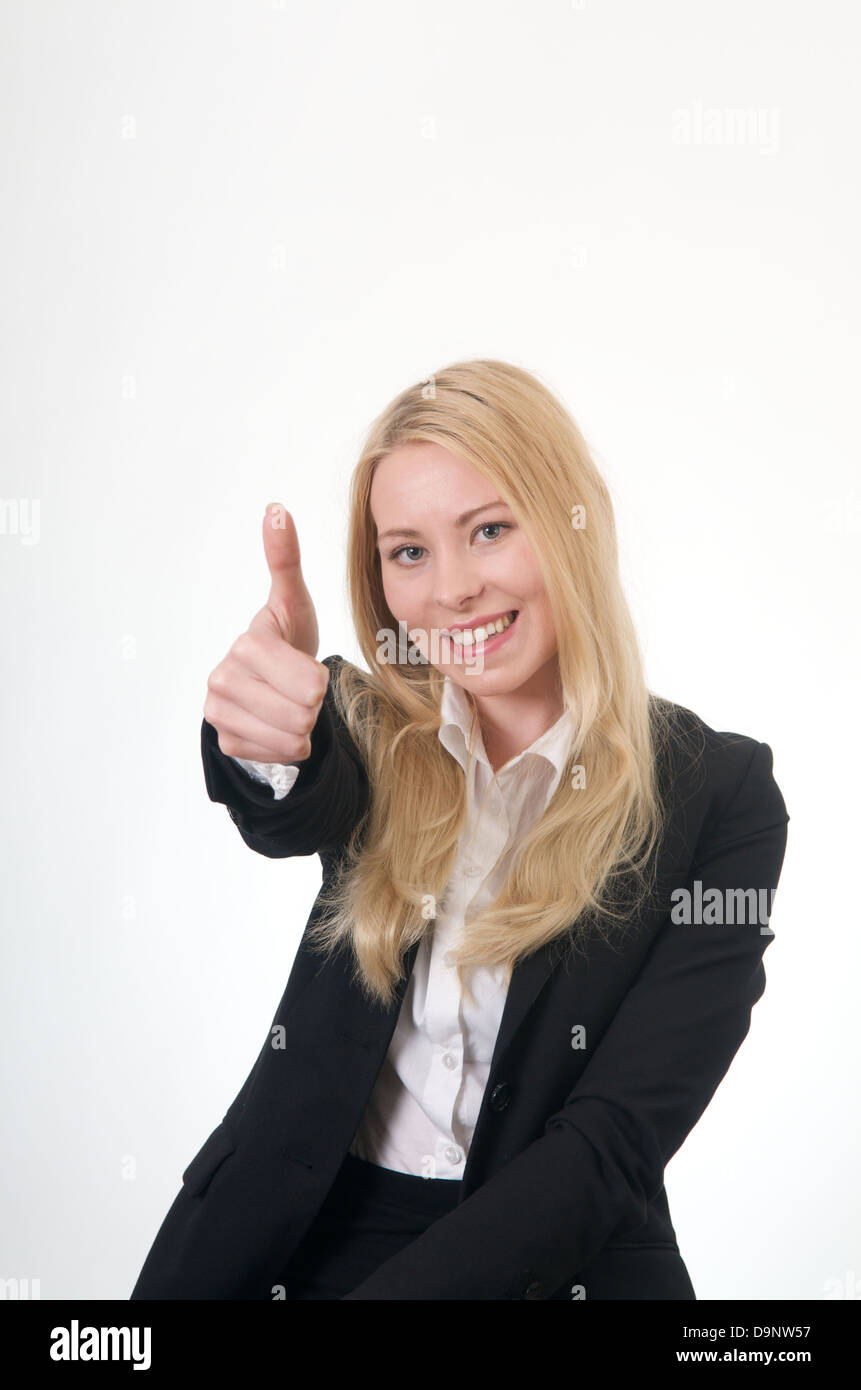 Successful girl thumbs up Stock Photo - Alamy