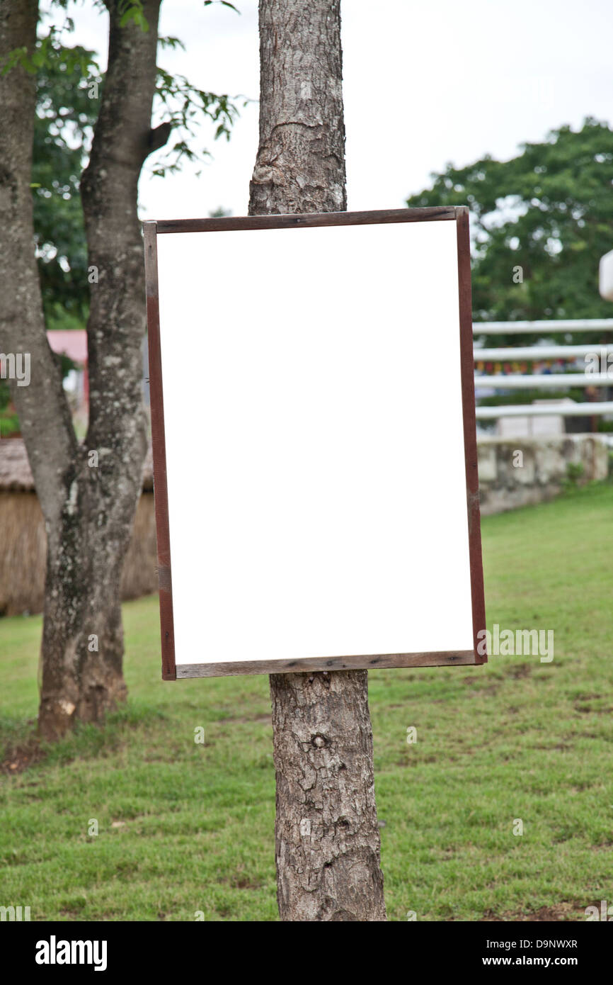 empty wooden sign post on garden Stock Photo - Alamy