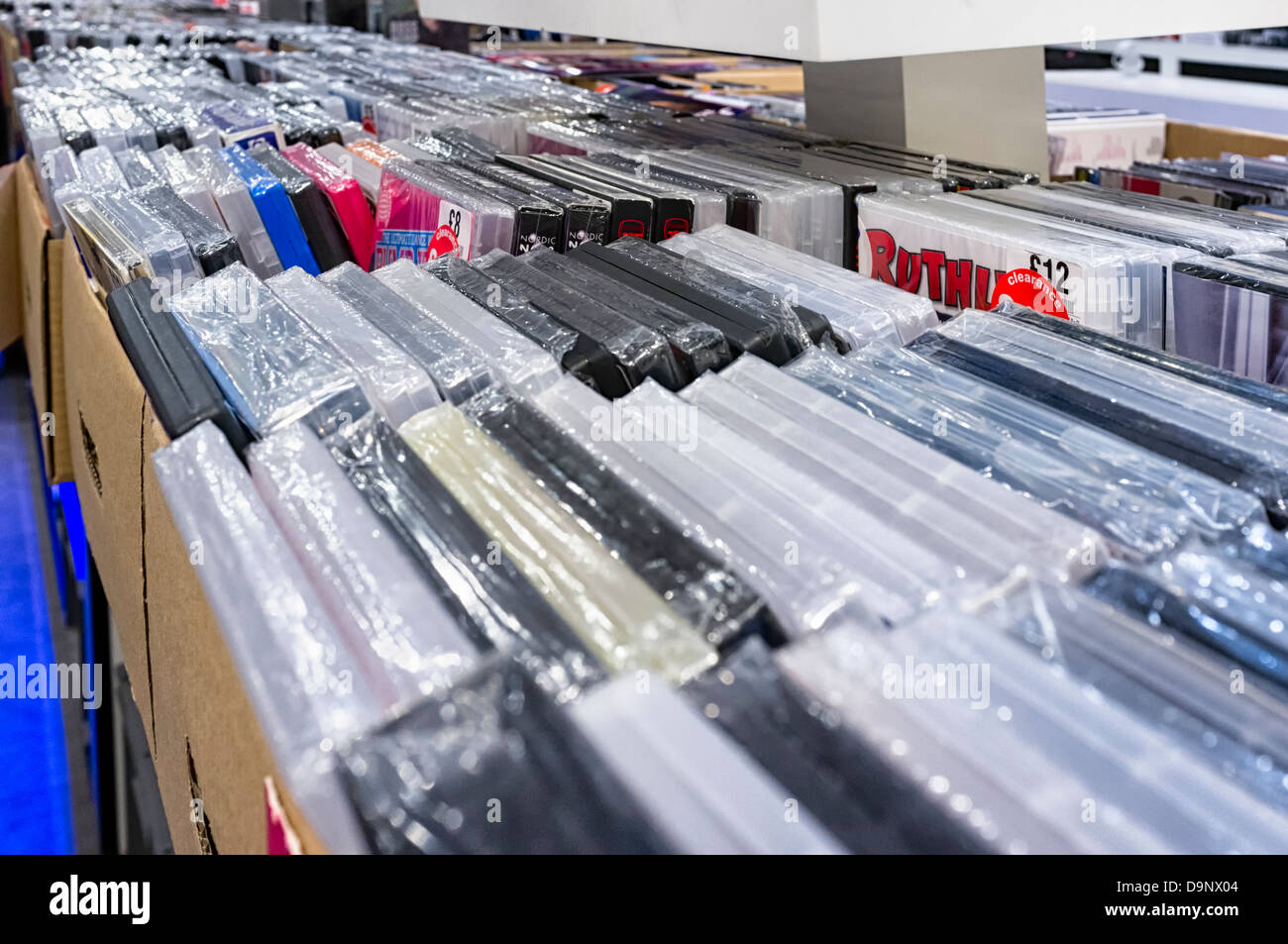 CD's and DVD's for sale in a high street shop Stock Photo - Alamy