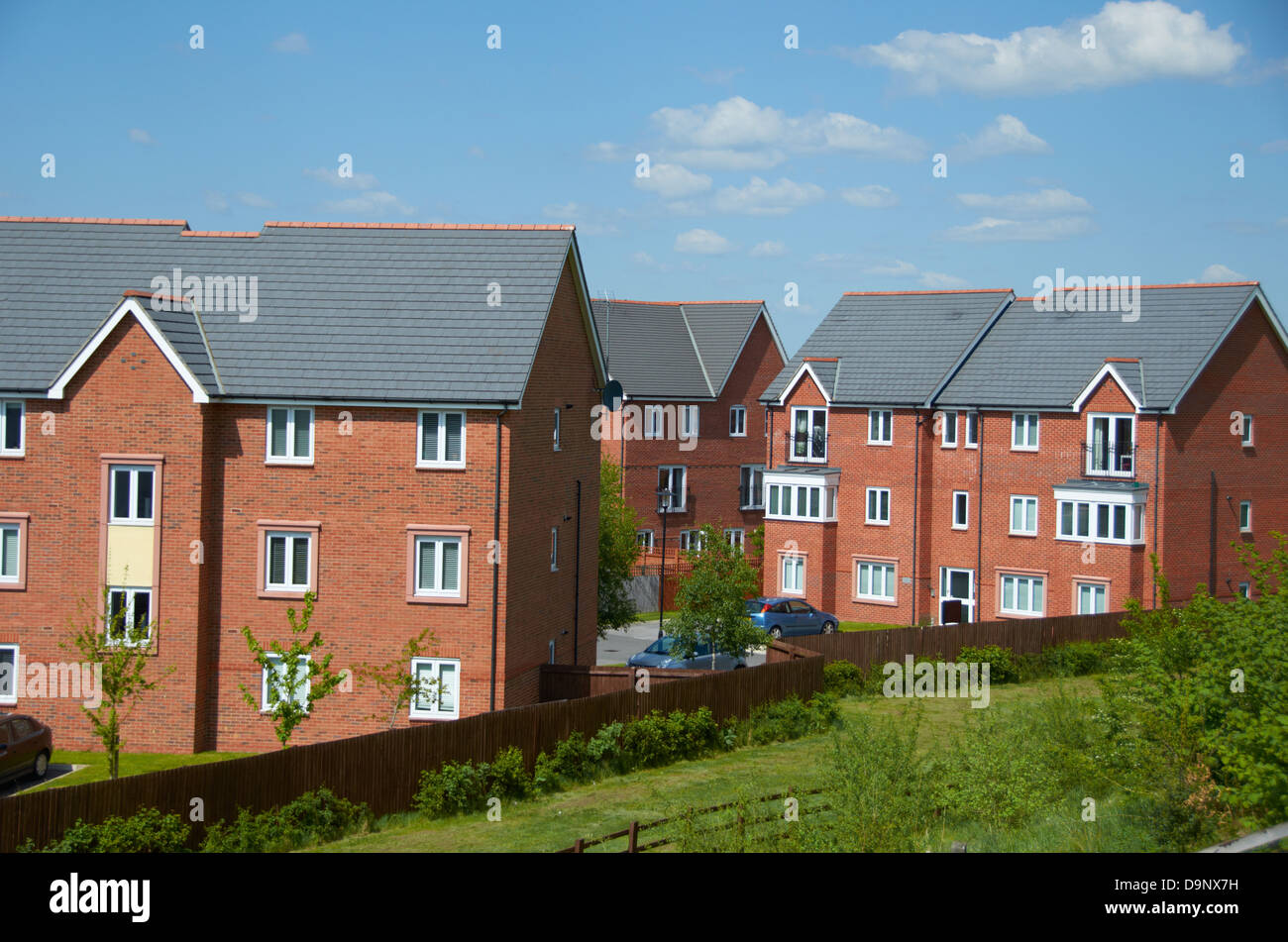 New build houses built next to a disused railway line/track Stock Photo ...