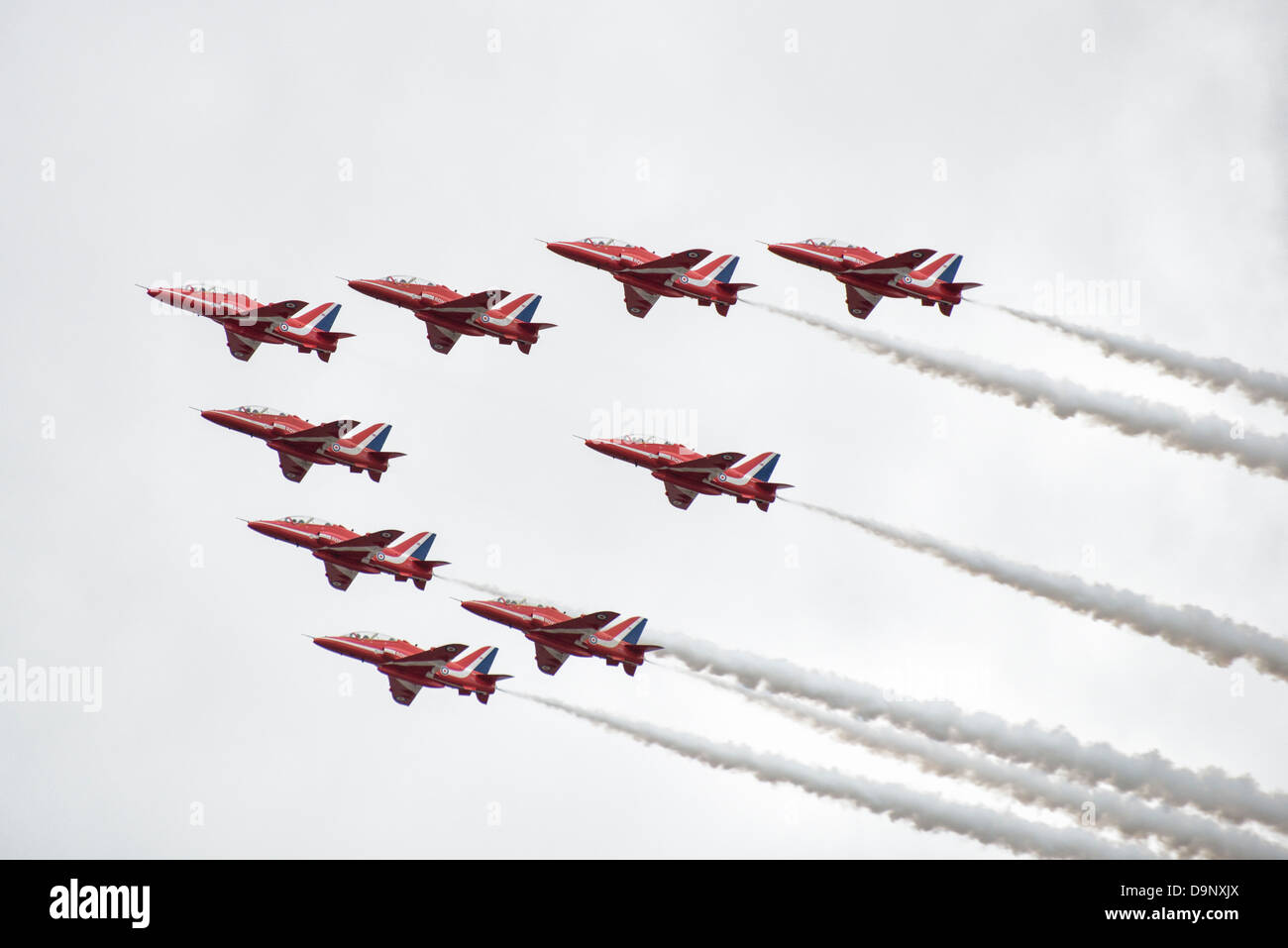 The Red Arrows fly in formation during their exciting aerobatic display ...