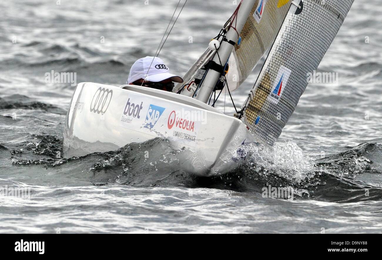 Kiel, Germany, 23 June 2013. German sailor Heiko Kroeger, leading ...