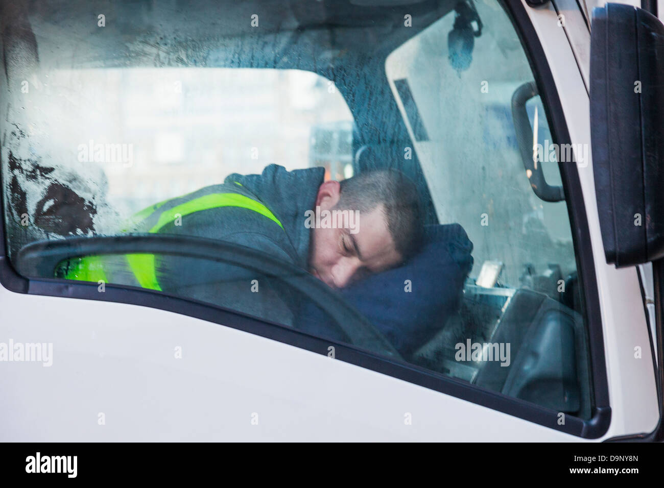 England, London, Delivery Van Driver Asleep at Wheel Stock Photo - Alamy