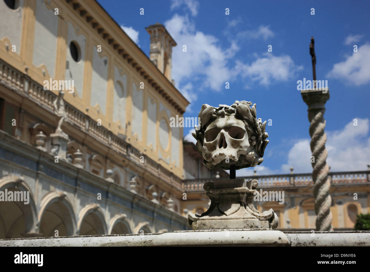 Skull on the balustrades in the monastic cemetery, Great Cloister of ...