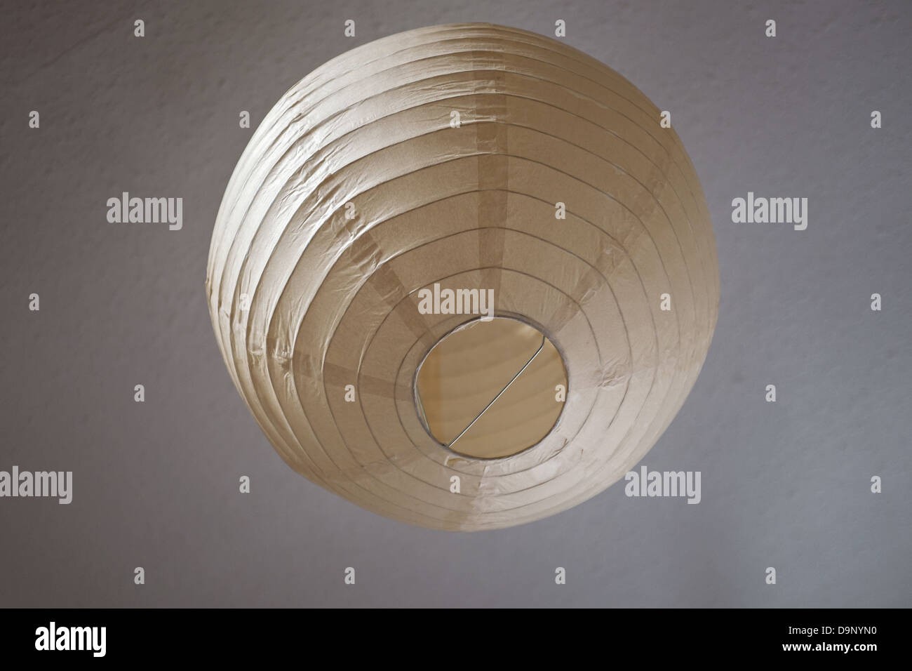 Ribbed ball paper light shade Stock Photo - Alamy
