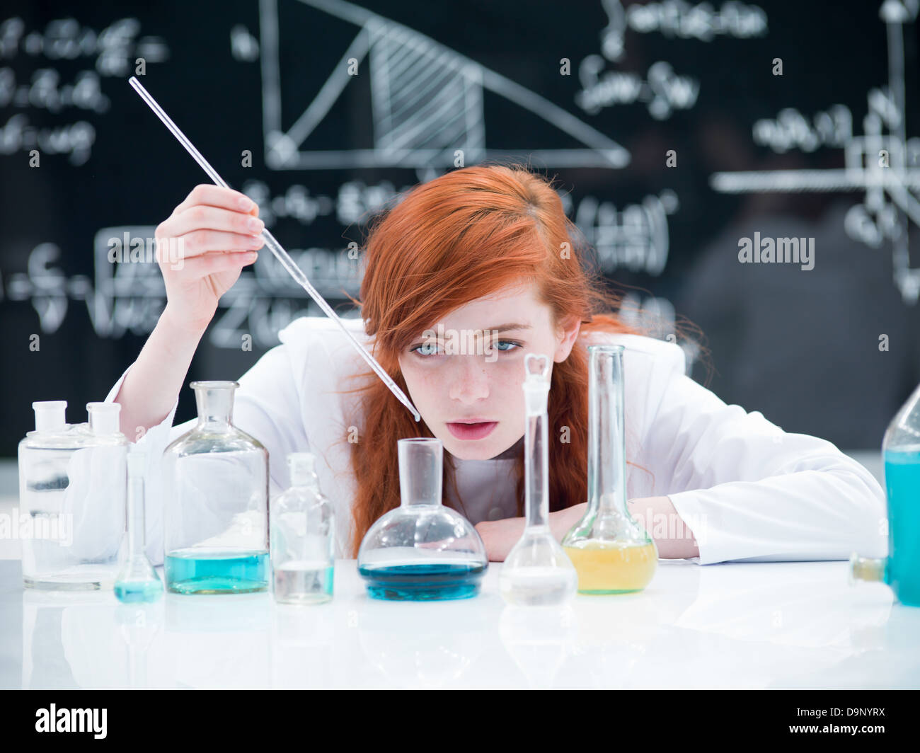 Woman laboratory container hi-res stock photography and images - Alamy