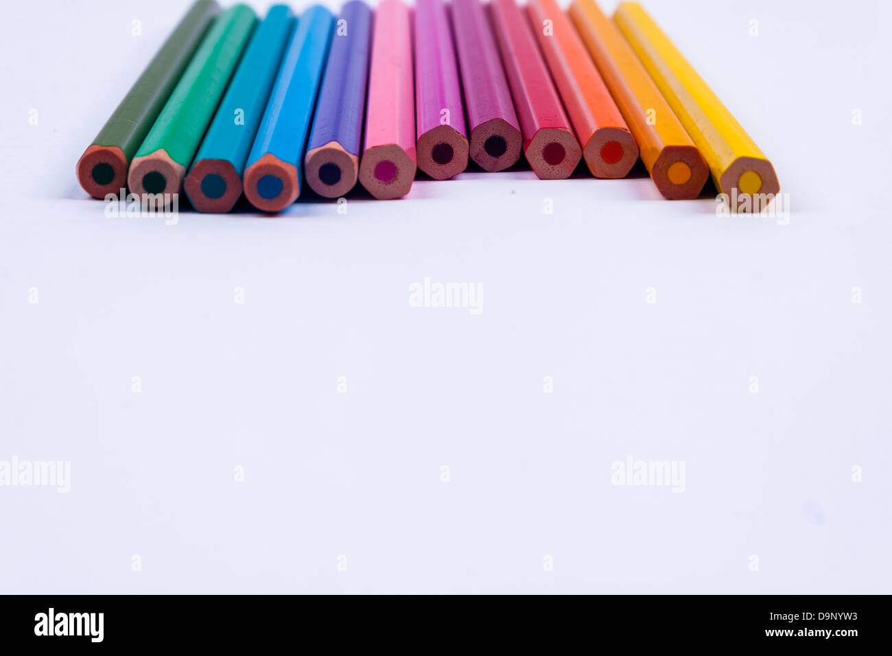 Pallet of colourful crayons on white background Stock Photo - Alamy