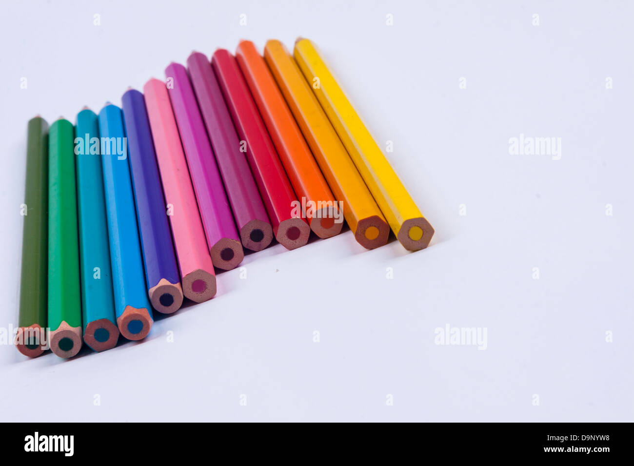 Pallet of colourful crayons on white background Stock Photo - Alamy