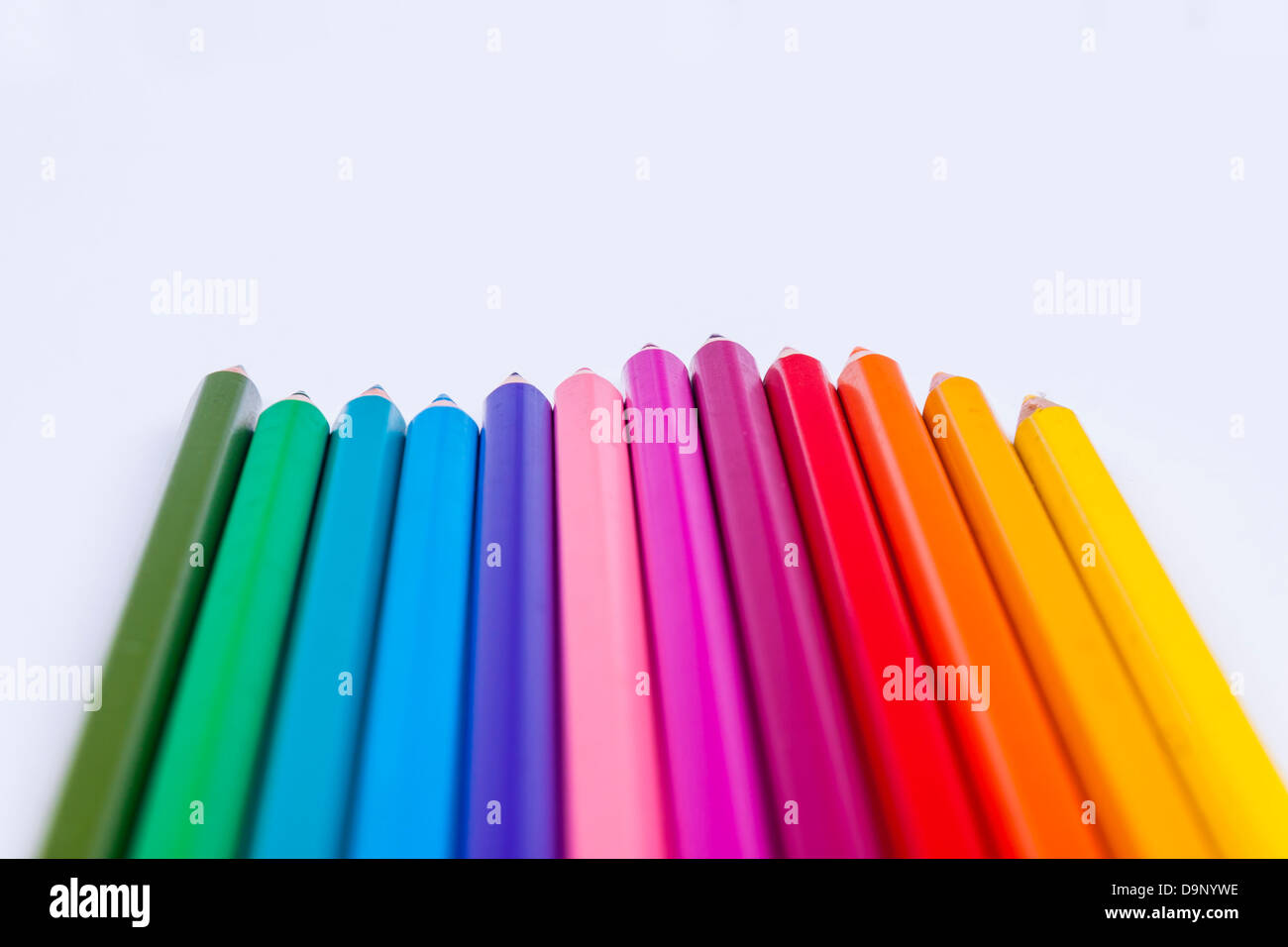 Pallet of colourful crayons on white background Stock Photo - Alamy