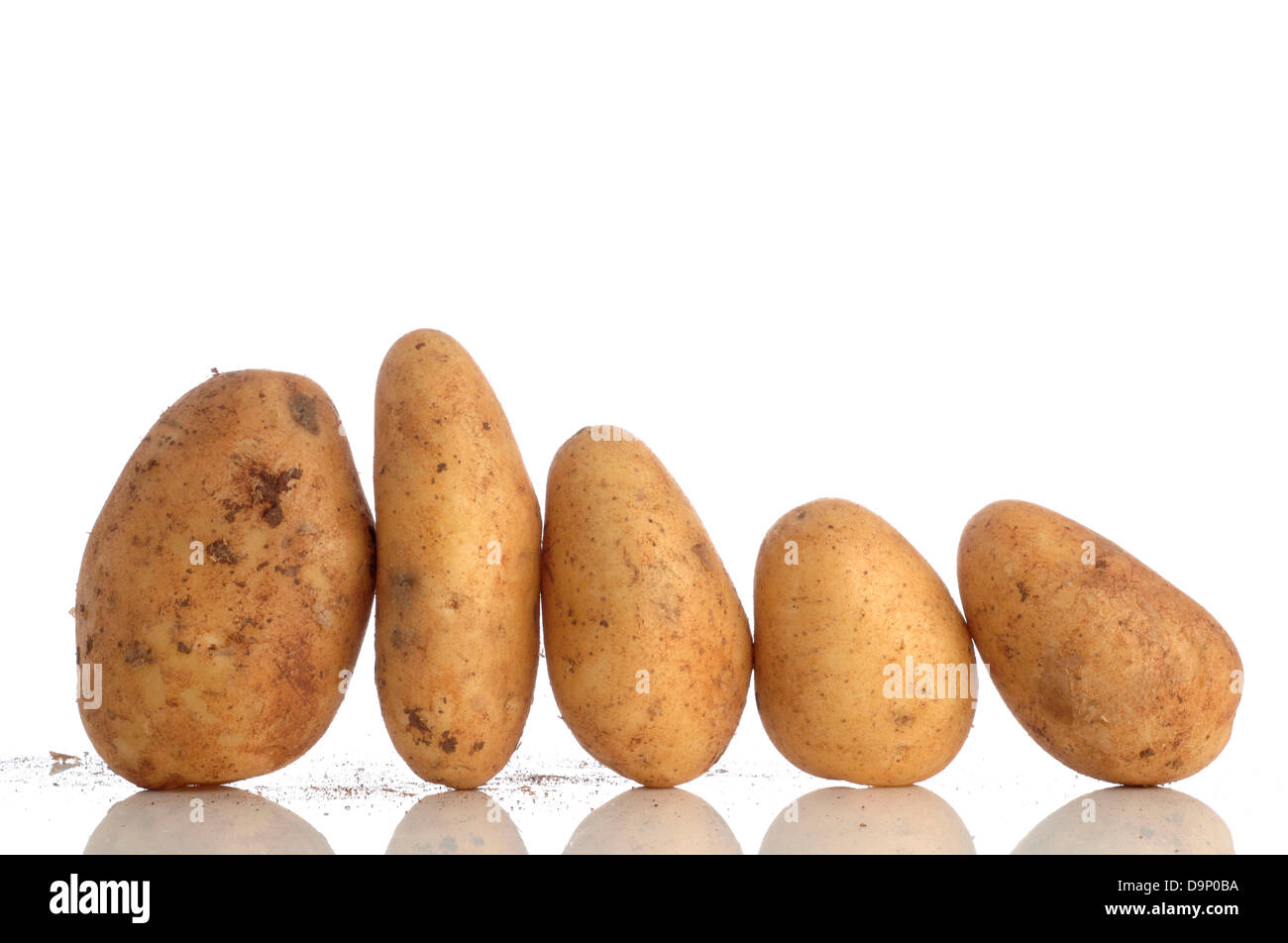 Five potatoes in a row Stock Photo - Alamy