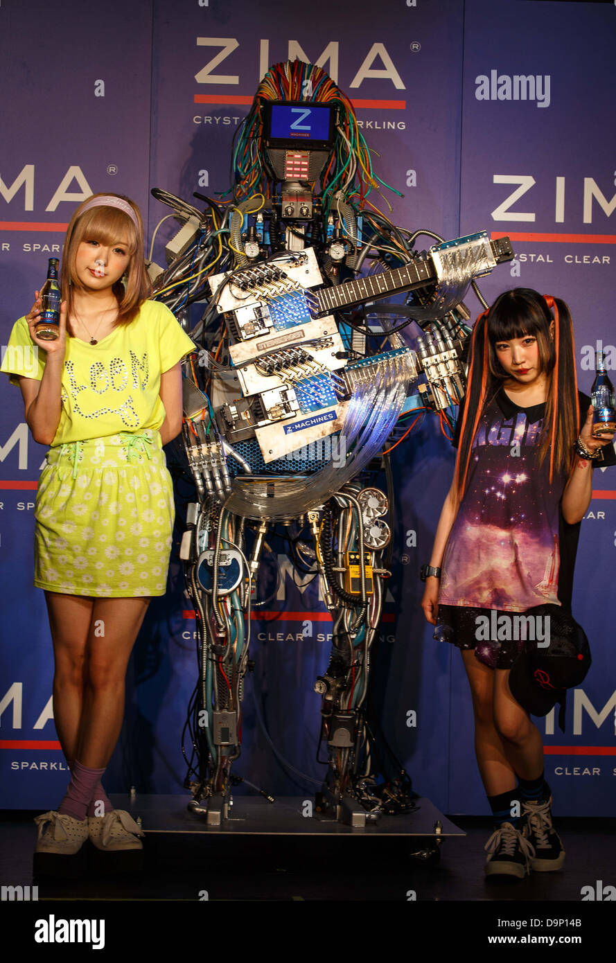 June 24, 2013, Tokyo, Japan - Japanese pop-duo Amoyamo pose on stage ...