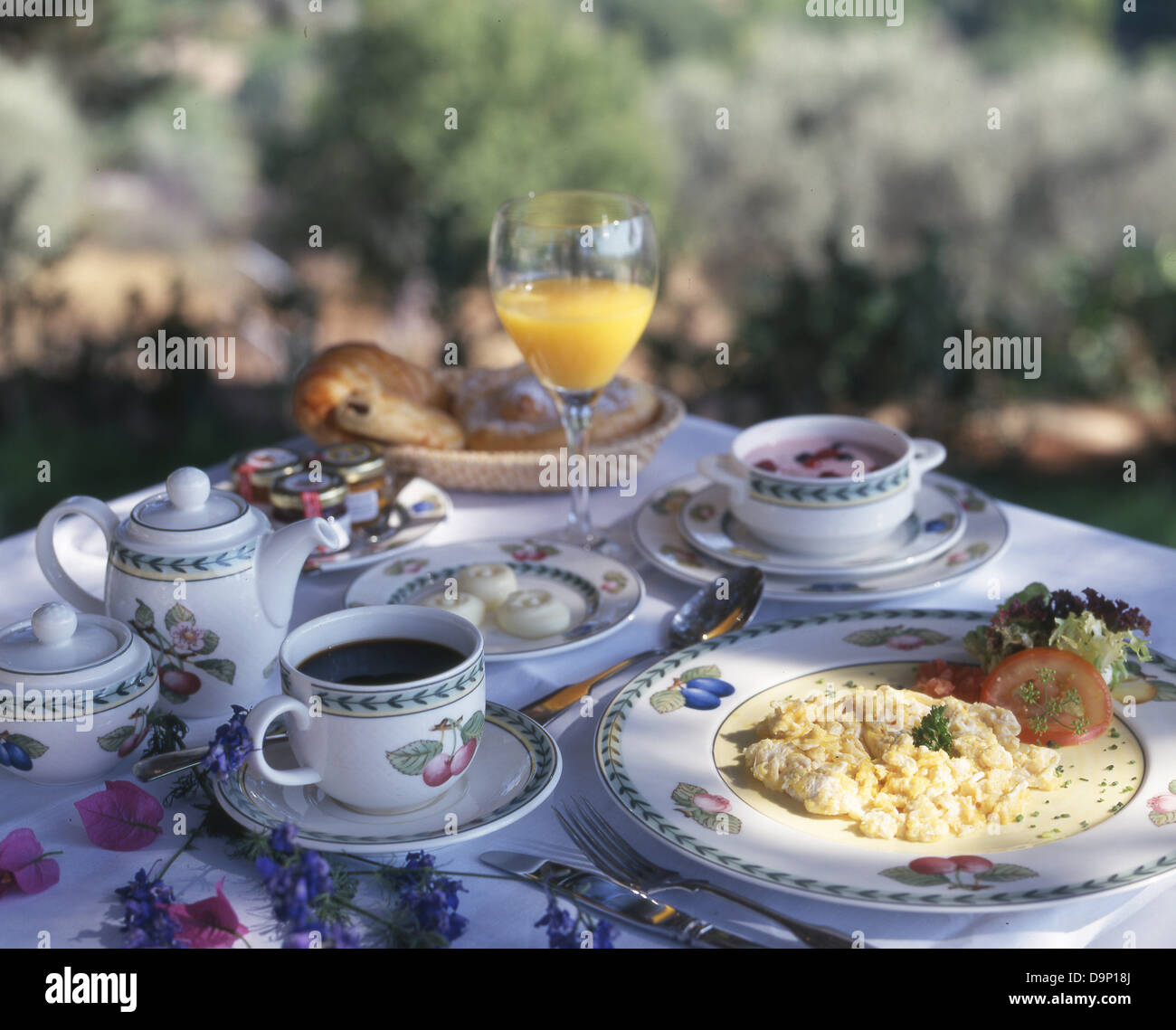 Breakfast table outdoors Stock Photo - Alamy