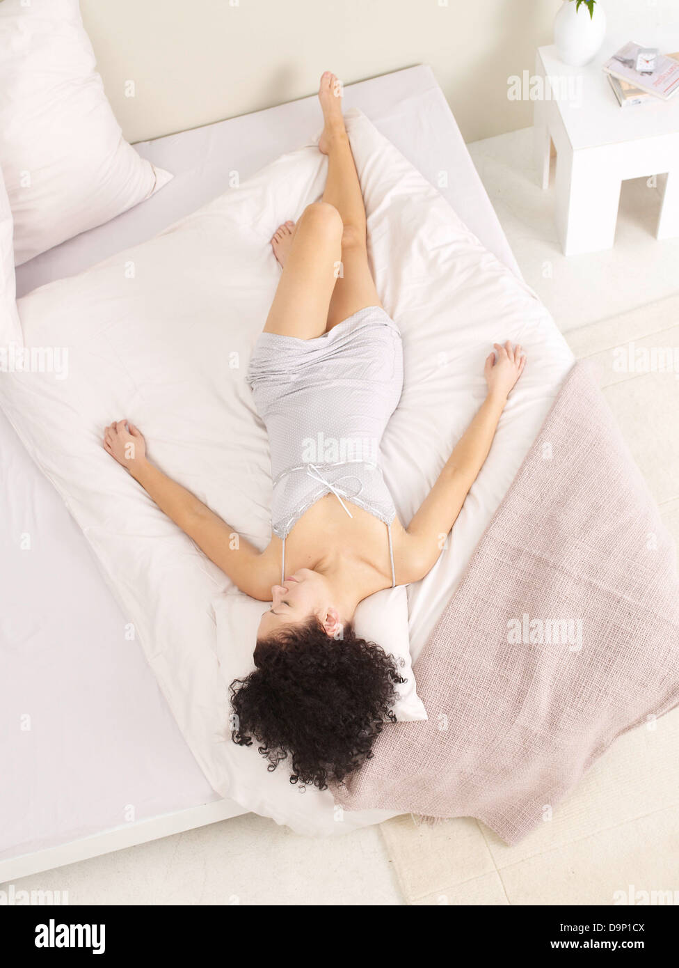 woman in bed Stock Photo - Alamy