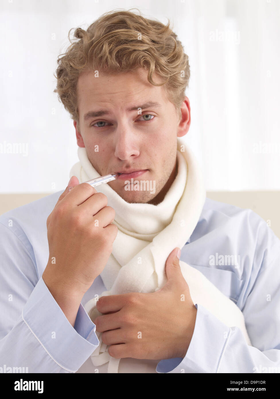 sick young man Stock Photo - Alamy