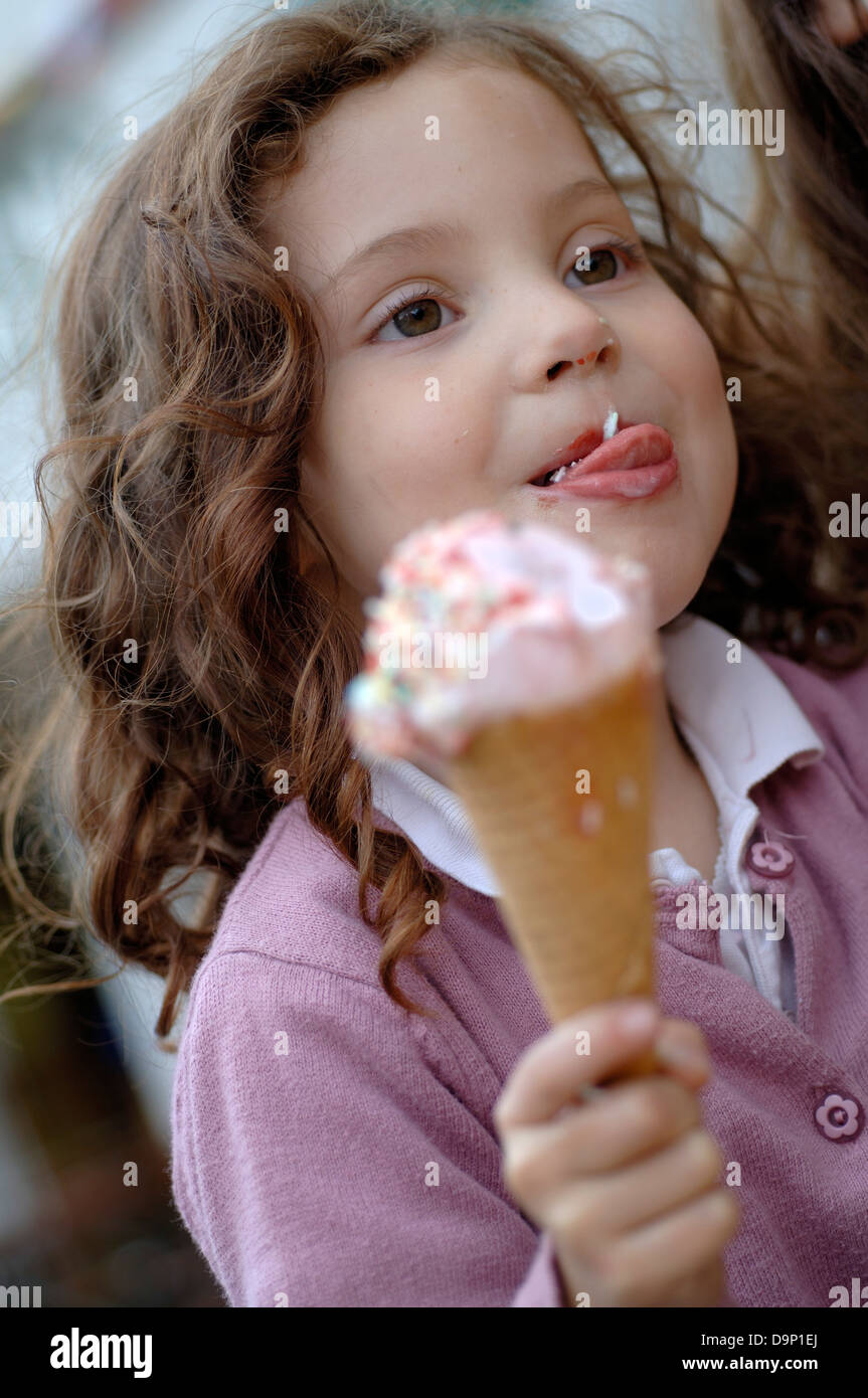 Girl eating ice cream Stock Photo - Alamy