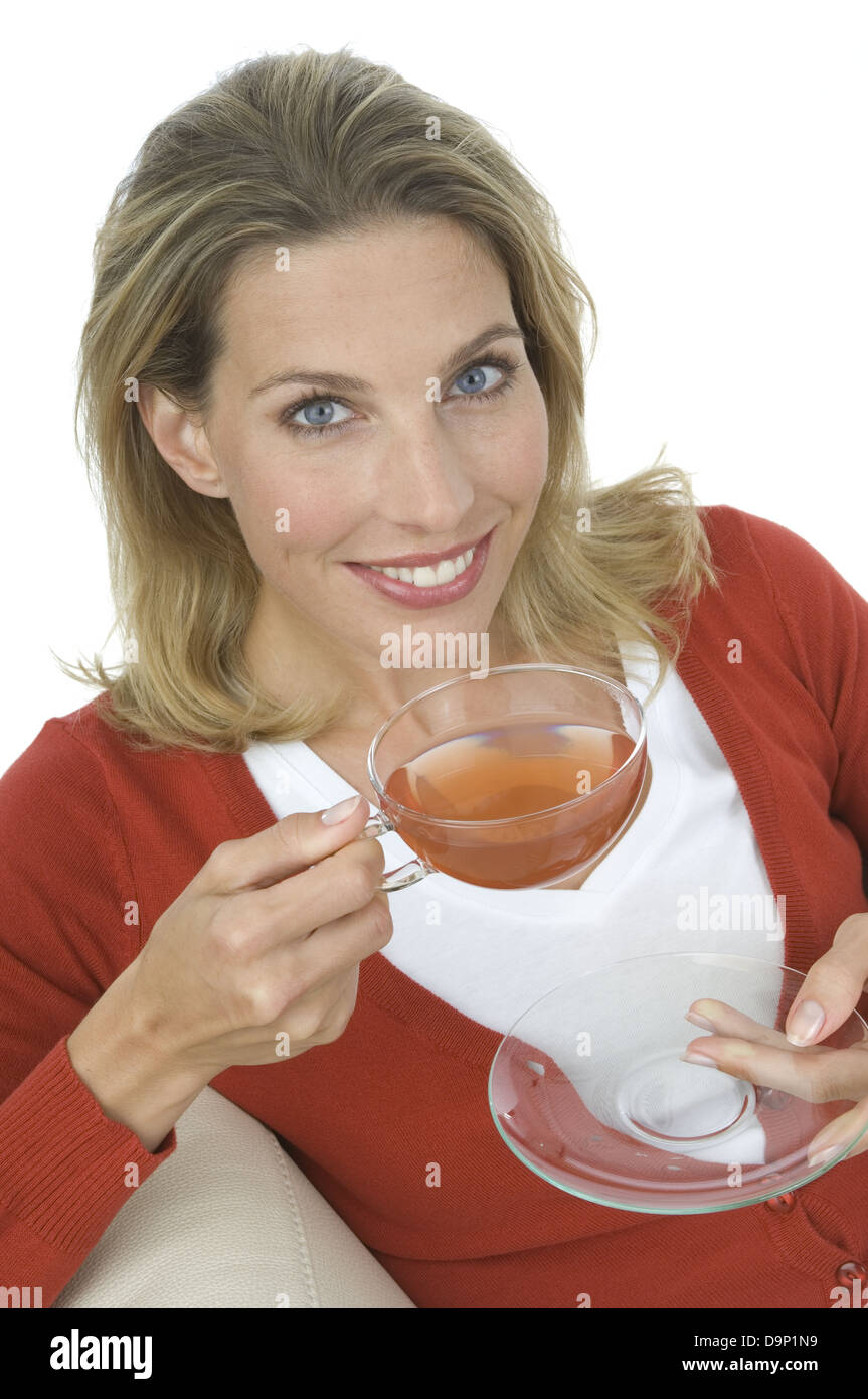 Woman drinking tea Stock Photo - Alamy